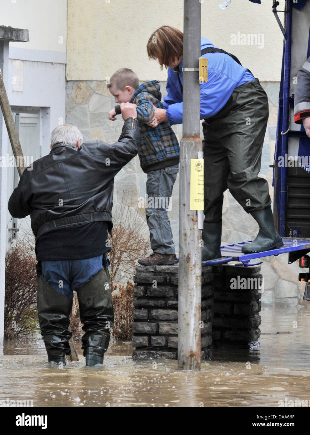 Staff of German Federal Agency for Technical Relief (THW) help people ...
