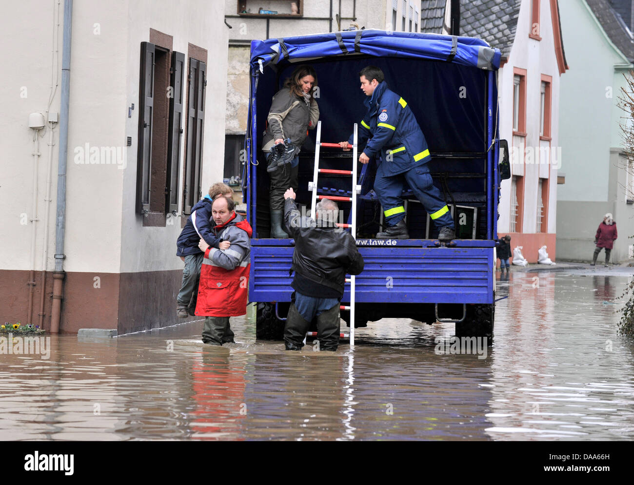 Staff of German Federal Agency for Technical Relief (THW) help people ...