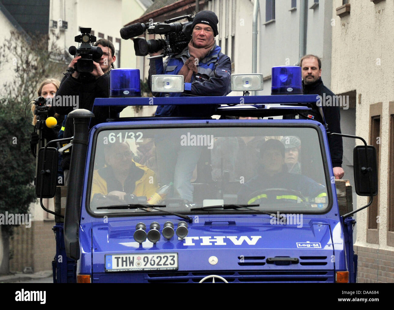 Staff of German Federal Agency for Technical Relief (THW) drive camera ...