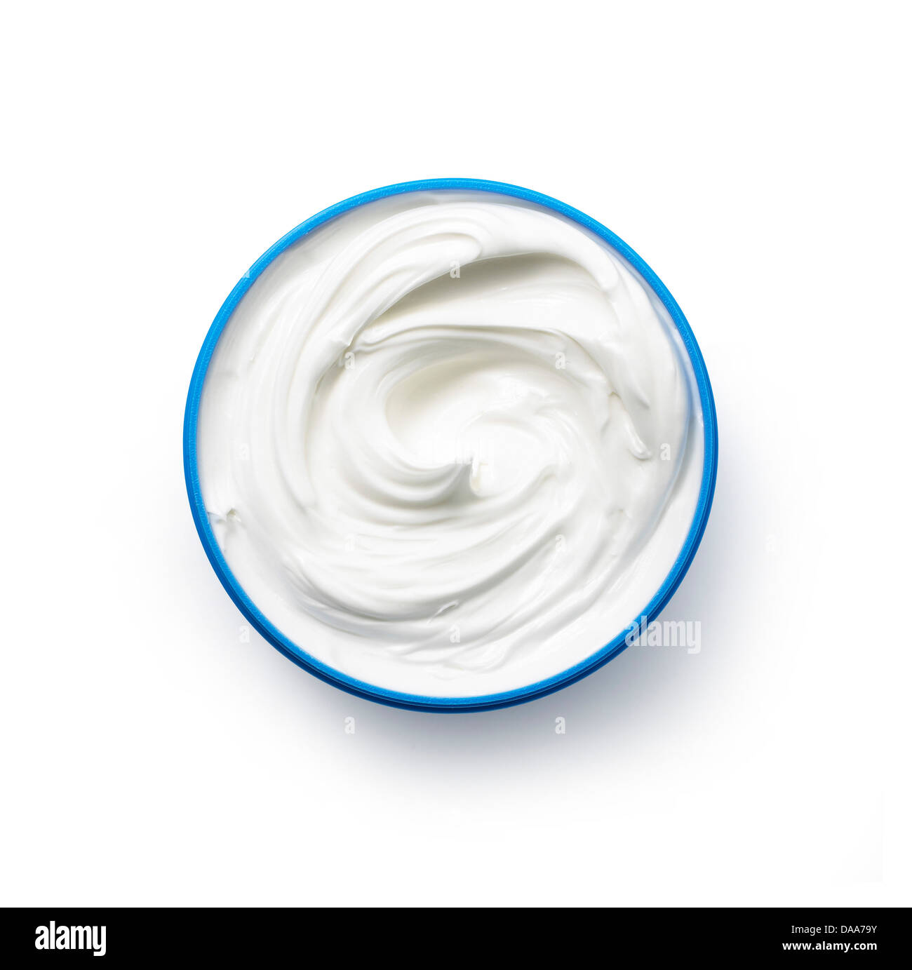 sweep of white beauty cream oil gel product cut out onto a white ...