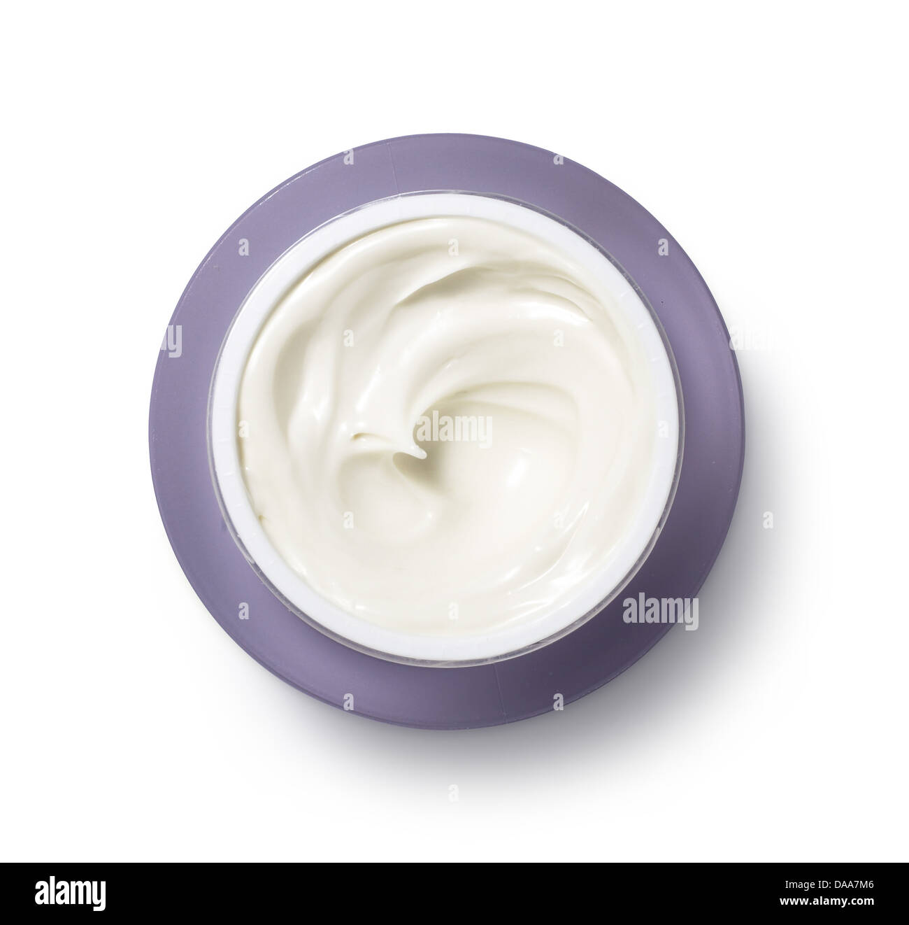 sweep of white beauty cream oil gel product cut out onto a white ...