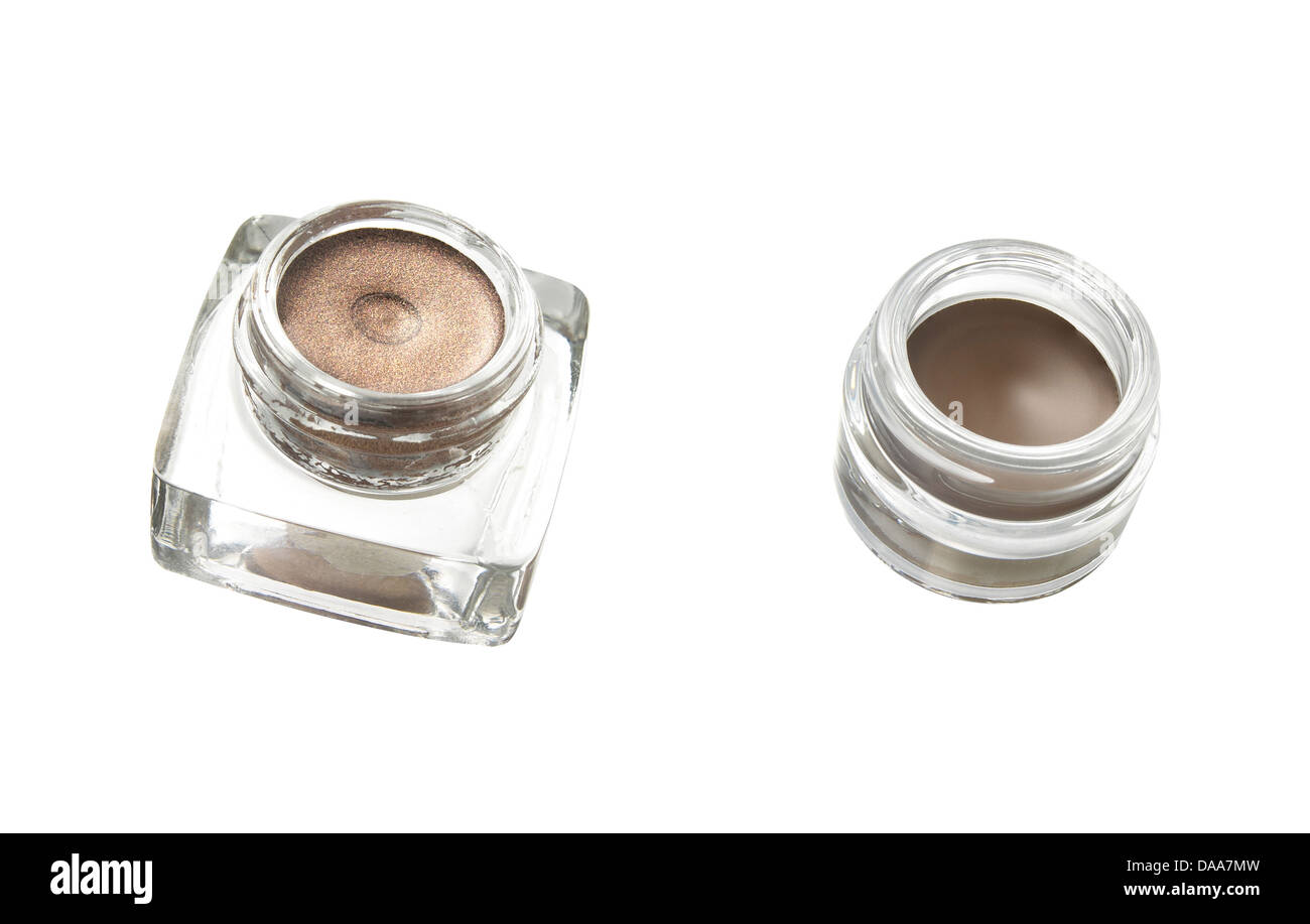 brown shimmer cream eyeshadow pots cut out onto a white background ...