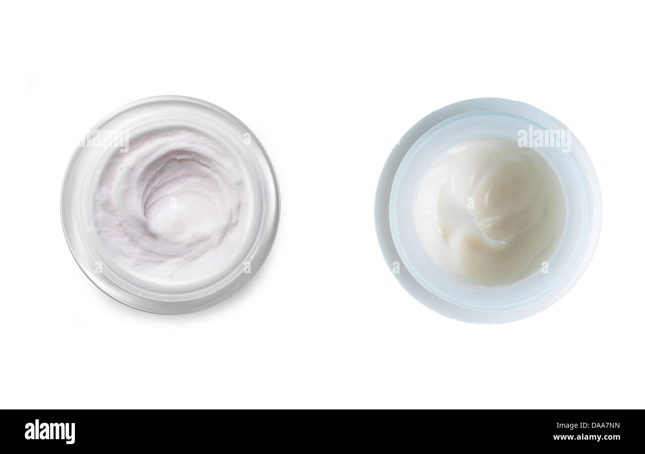 beauty cream pots cut out onto a white background Stock Photo - Alamy