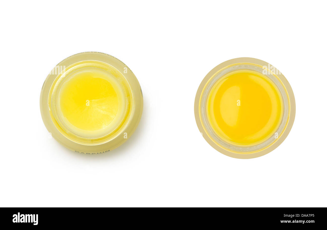 yellow balm cream gel pot cut out onto a white background Stock Photo ...