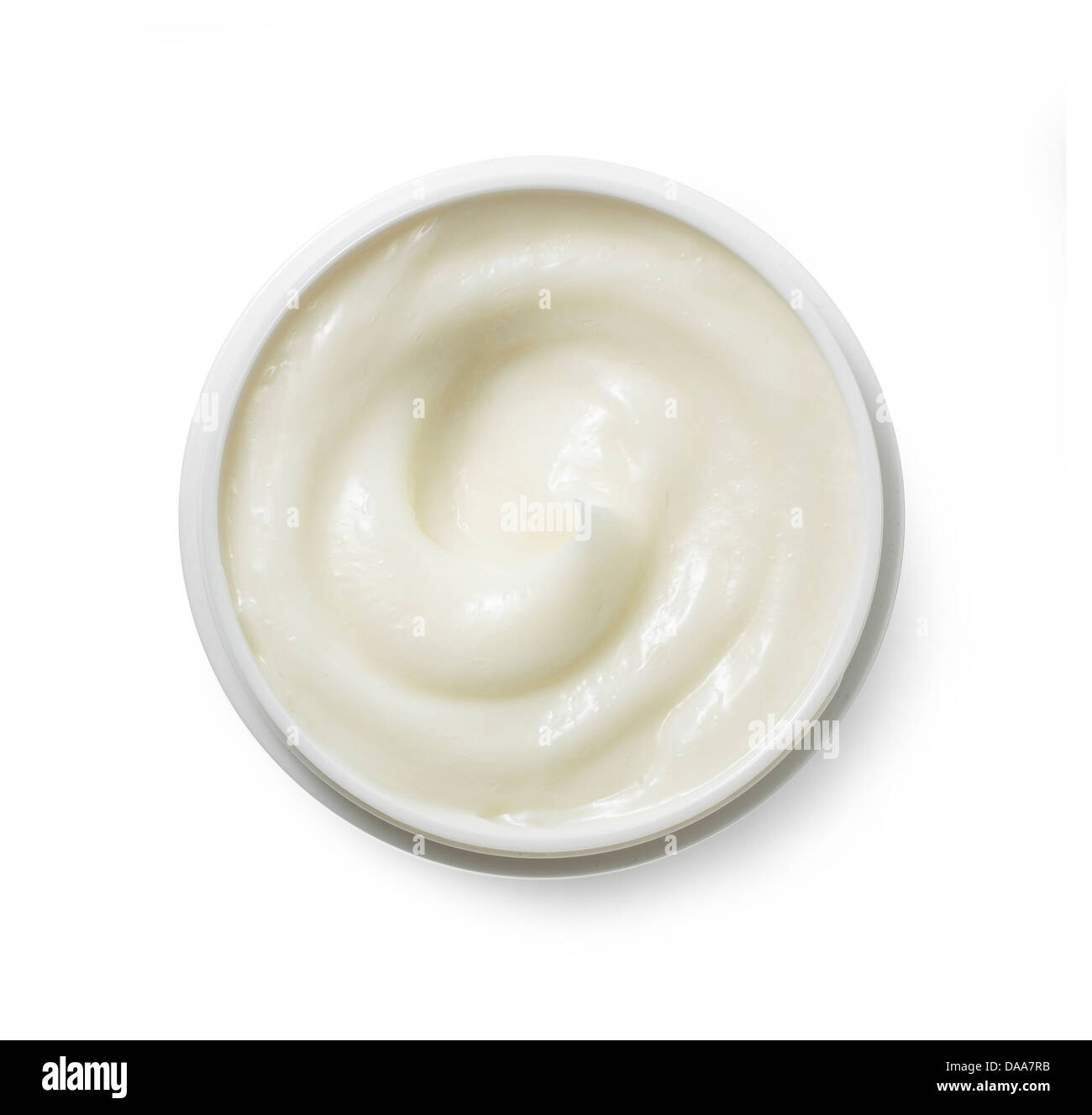 sweep of white beauty cream oil gel product cut out onto a white ...