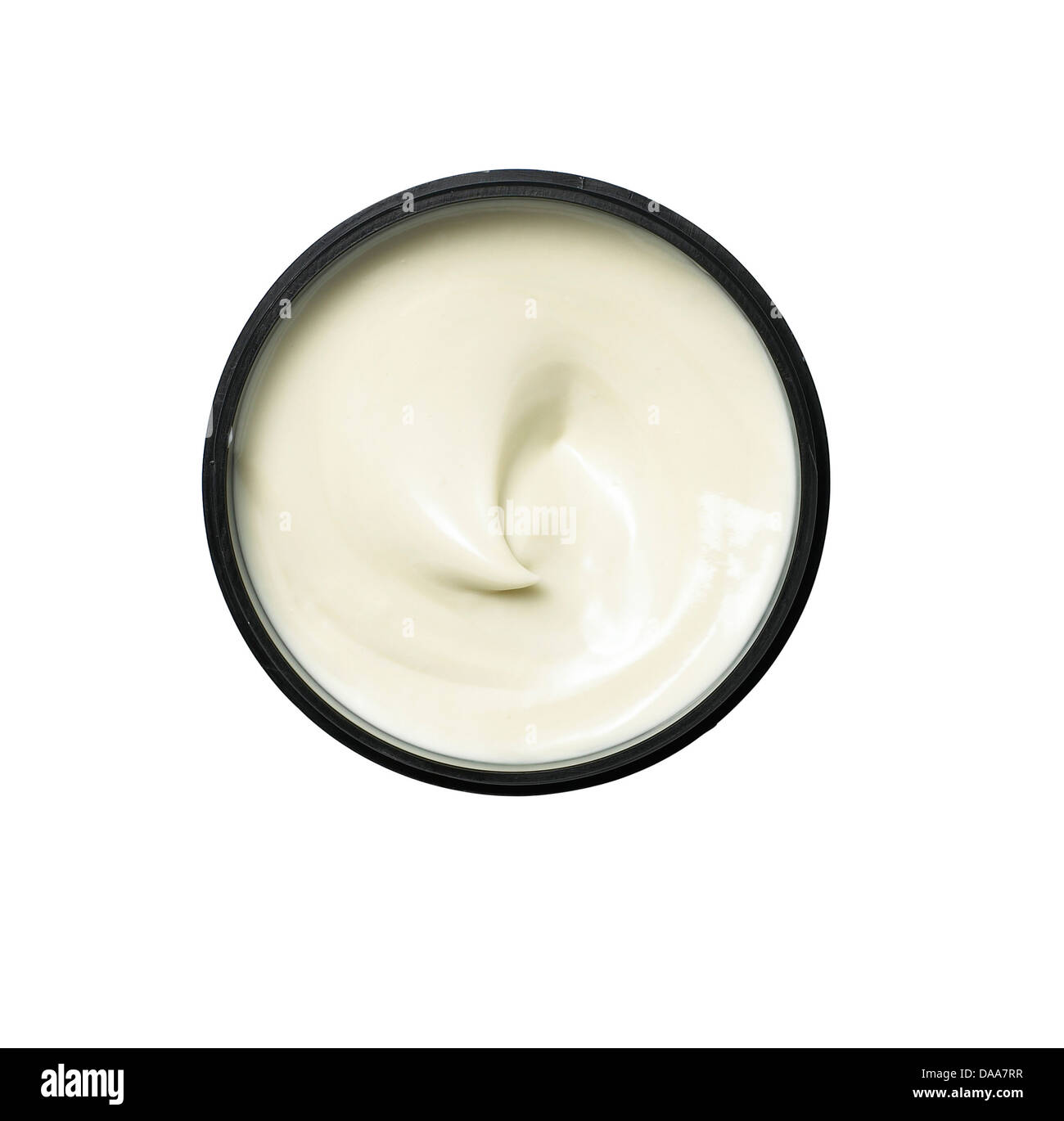 sweep of white beauty cream oil gel product cut out onto a white ...