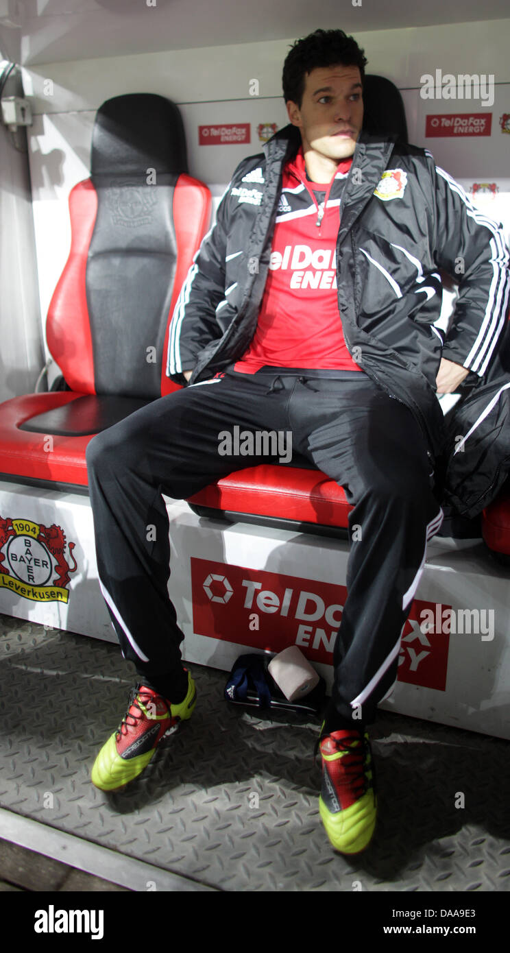Leverkusen's Michael Ballack sits on the bench prior to German ...