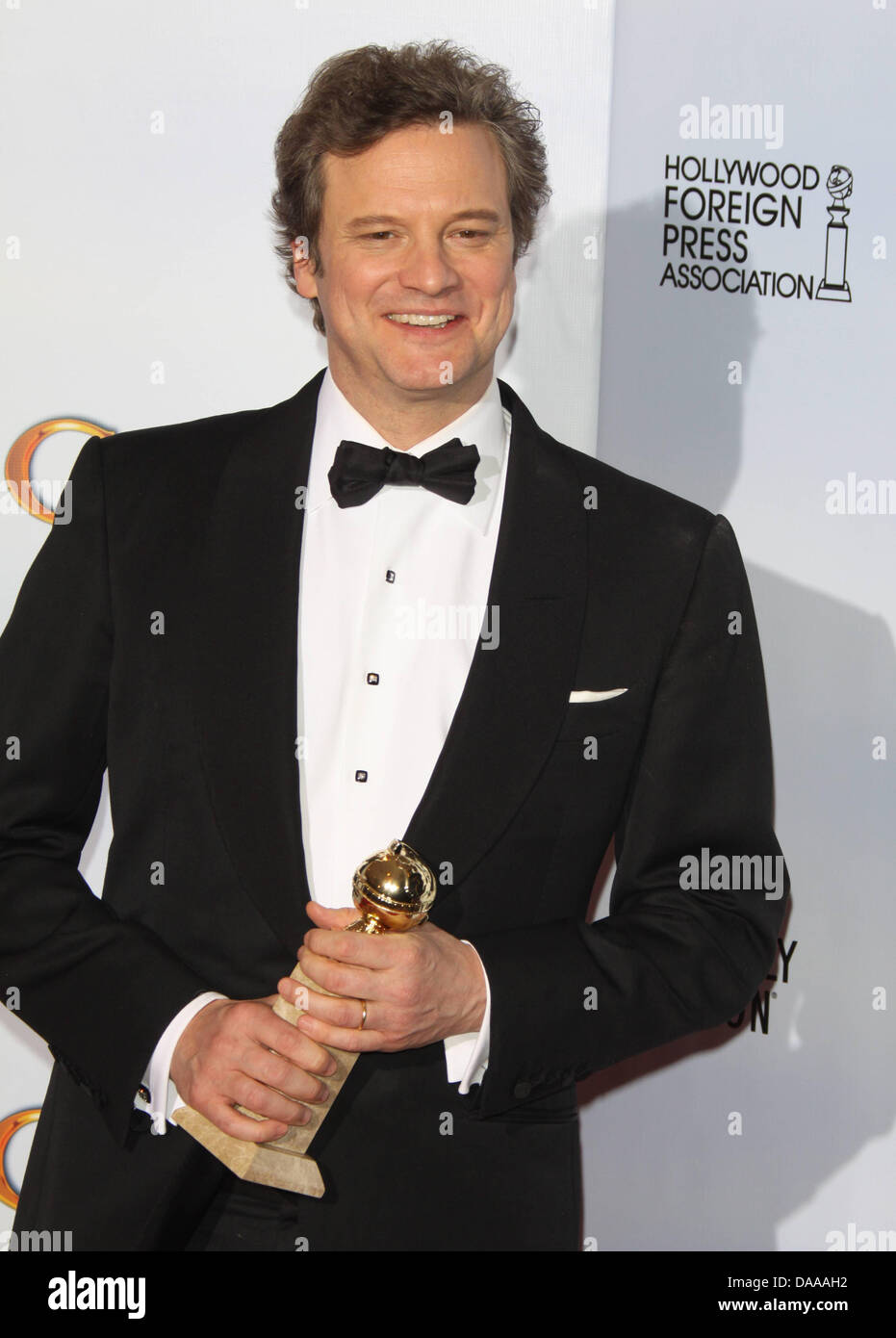Colin firth with his best actor award hi-res stock photography and ...
