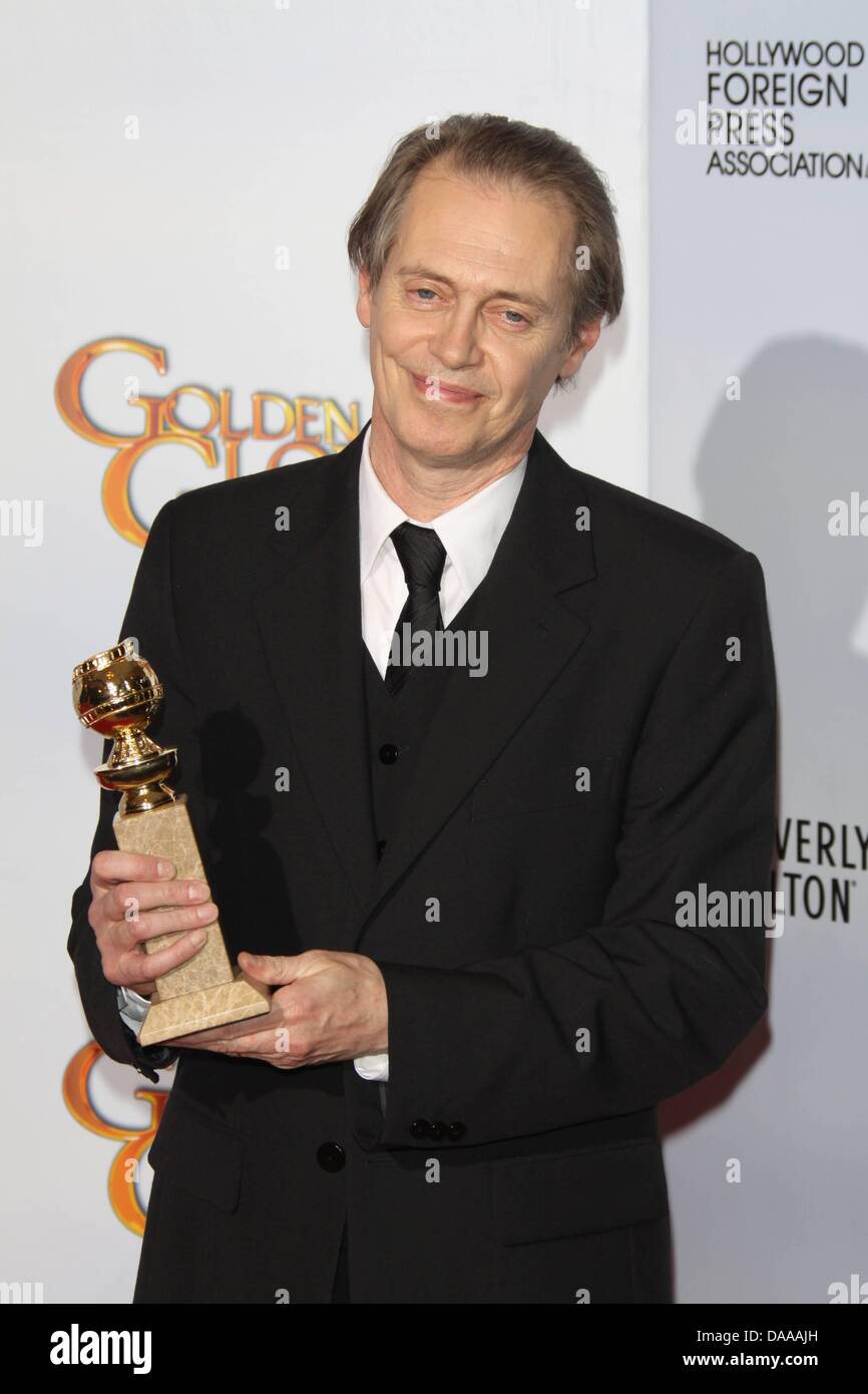 US actor Steve Buscemi holds up his award for 'Best Performance by an ...