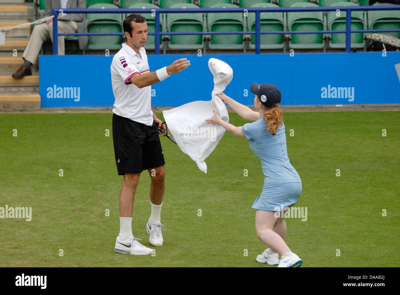 Radek Stepanek (Czech) giving a towel back to a ballgirl - Aegon Tennis ...