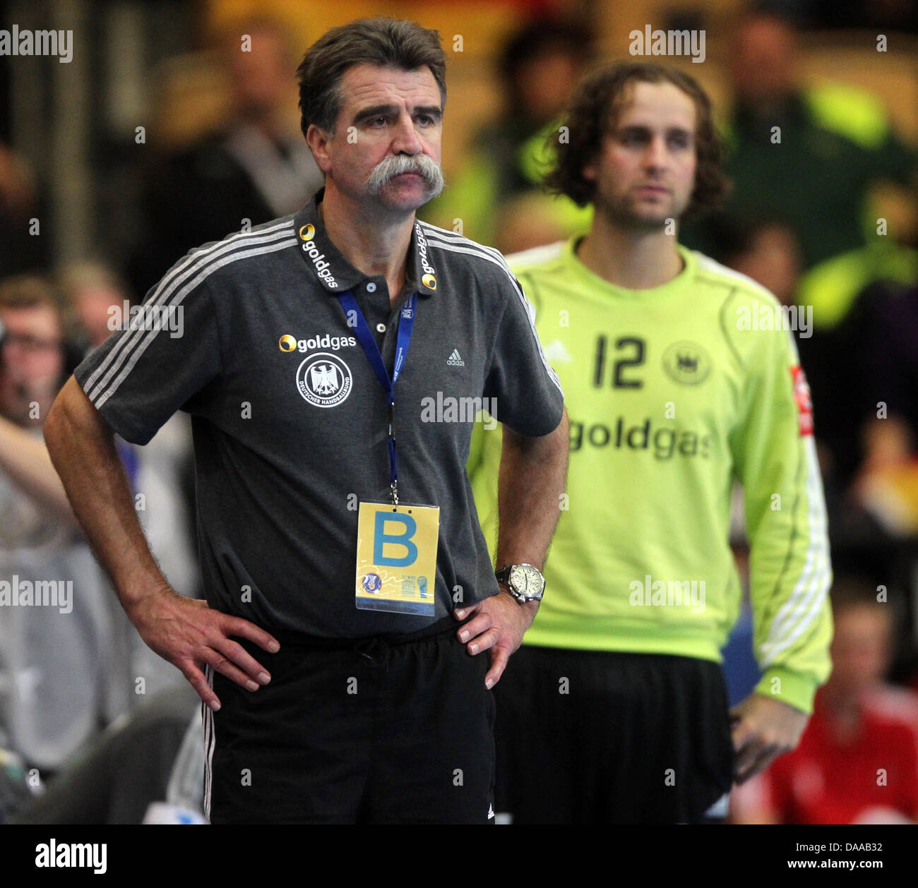 Heiner Brand (L), head coach of Germany and goalkeeper Silvio ...