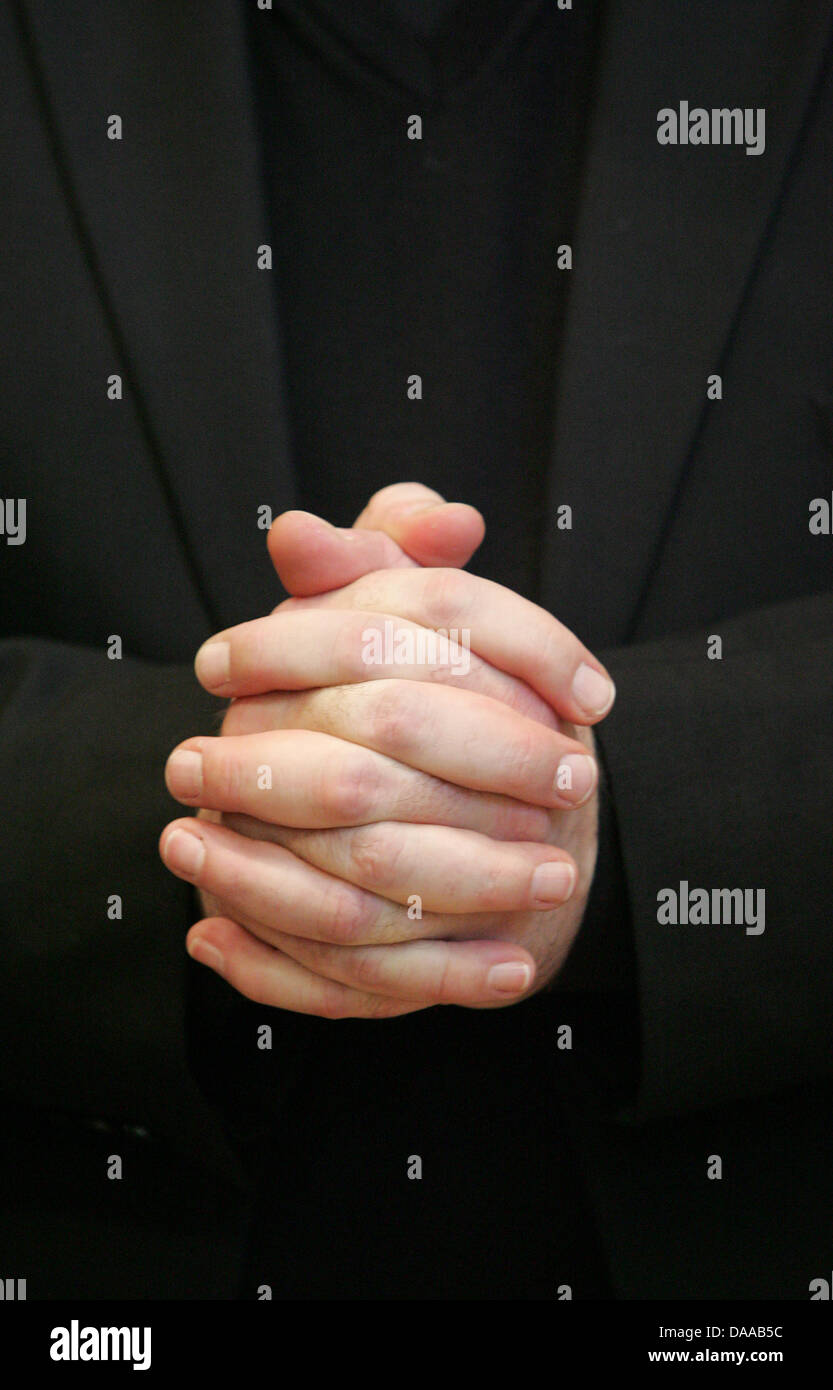 A file picture dated 19.December 2008.Praying hands photographed in ...