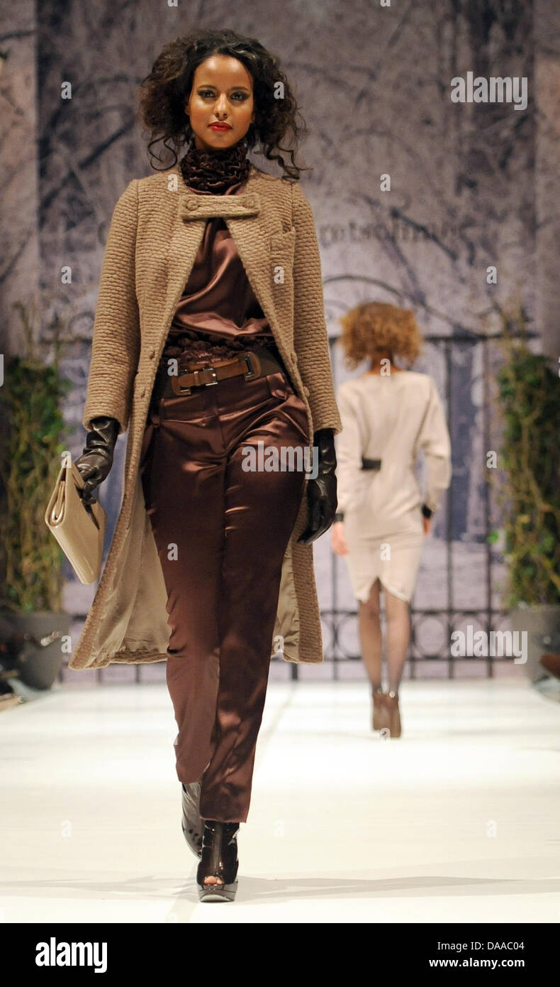 A model presents a creation at the Guido Maria Kretschmer show during ...
