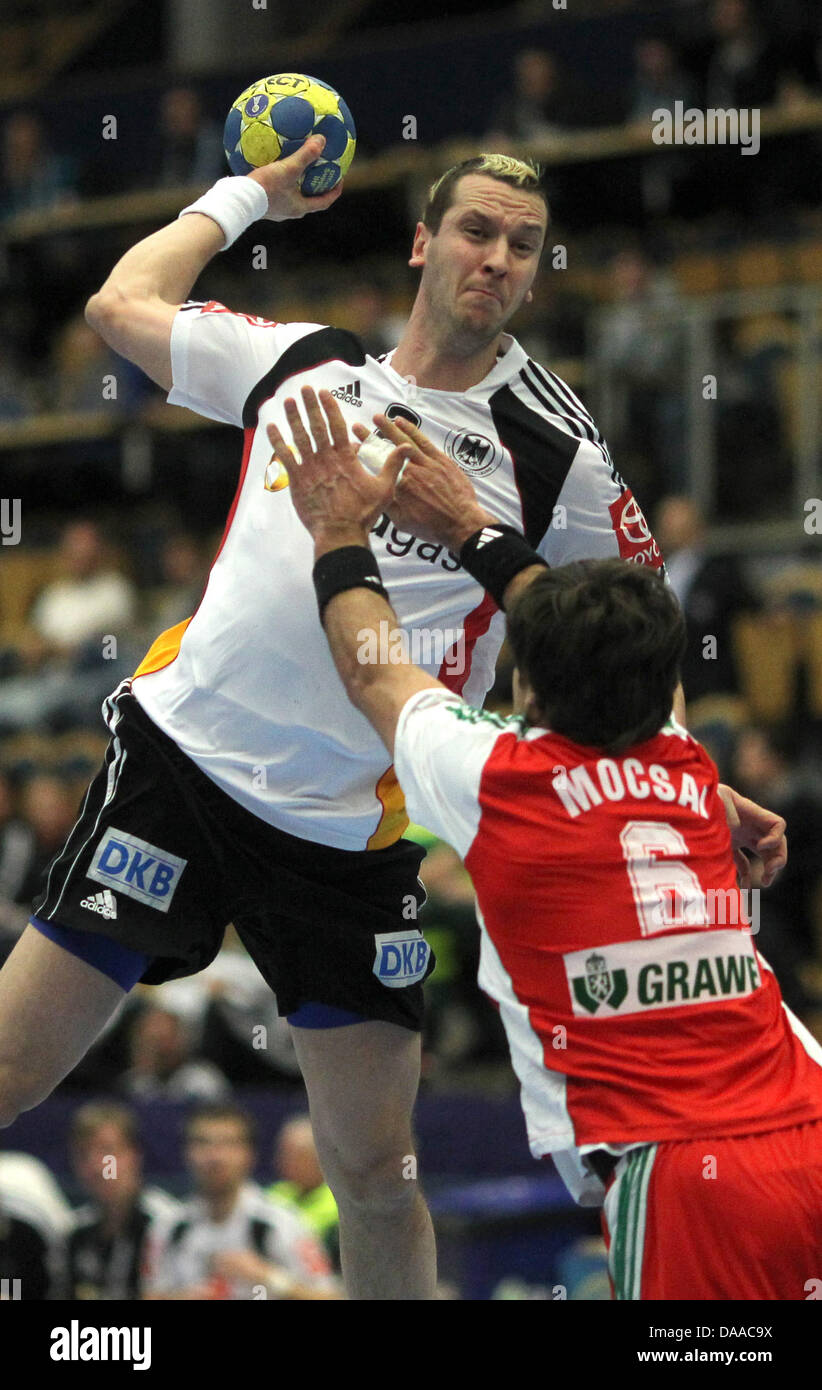 Pascal Hens (top) of Germany in action against Tamas Mocsai of Hungary ...