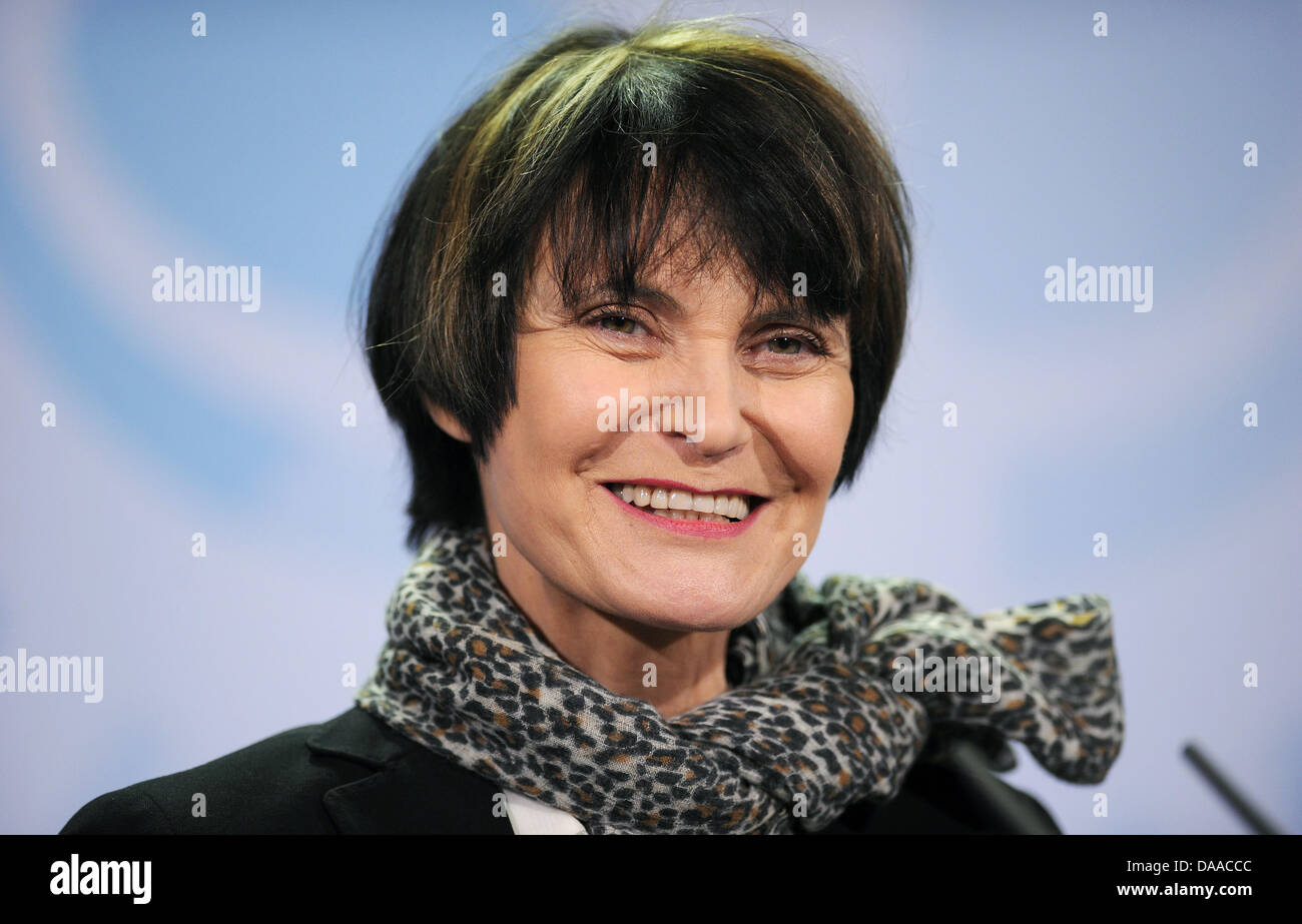 The President of Switzerland, Micheline Calmy-Rey smiles after a press ...