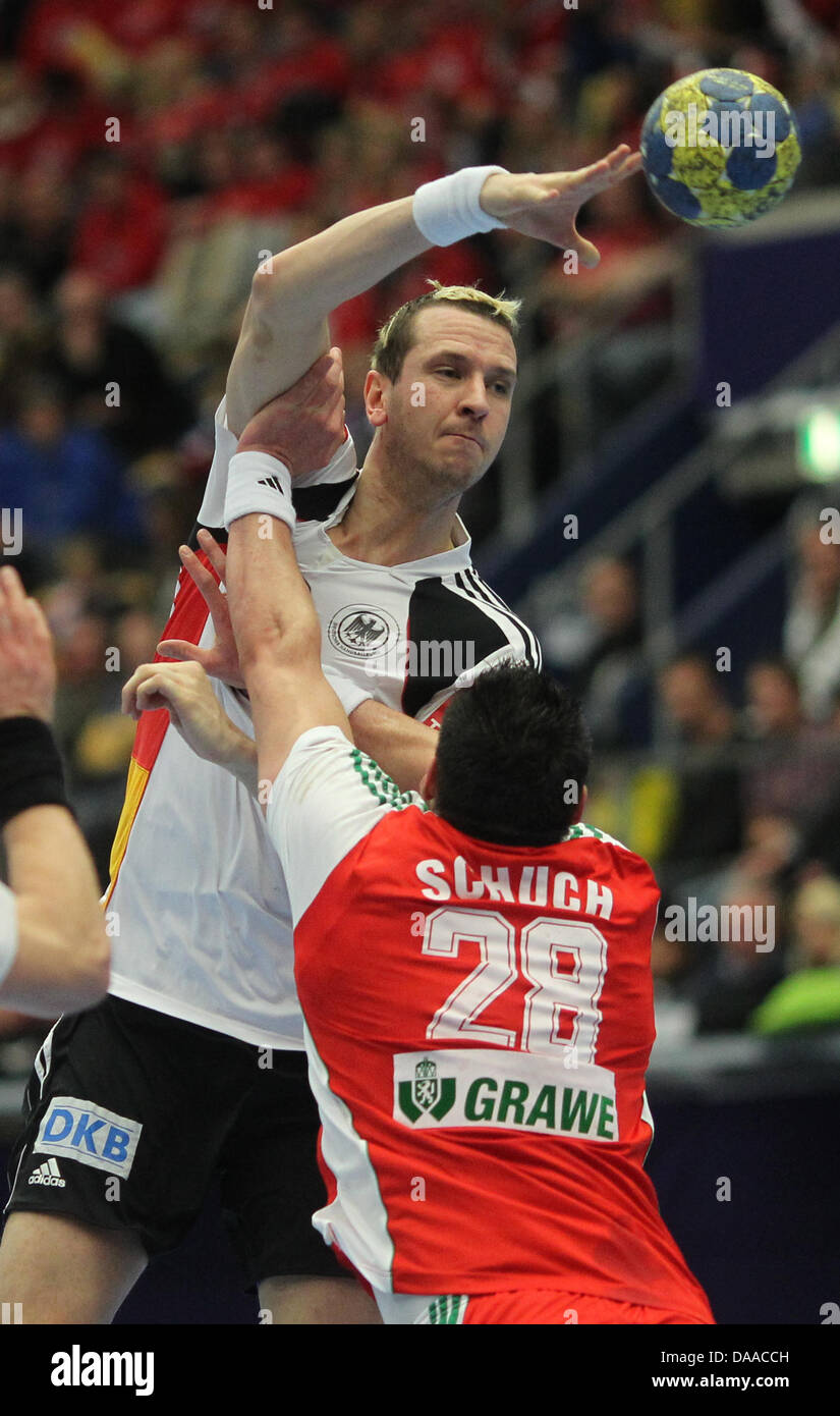 Pascal Hens (L) of Germany against Timuzsin Schuch of Hungary during ...
