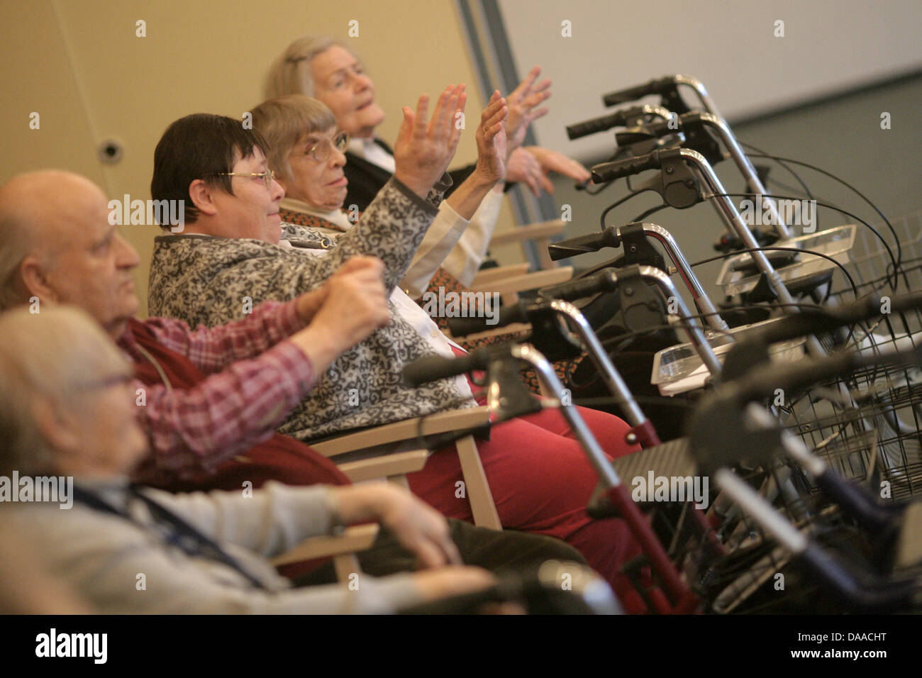 Senior citizens dance with walking frames at a retirement home in Mainz ...