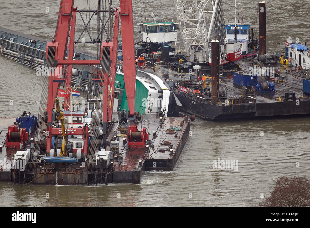 The Dutch crane ship Amsterdam (l) positions itself next to the ...