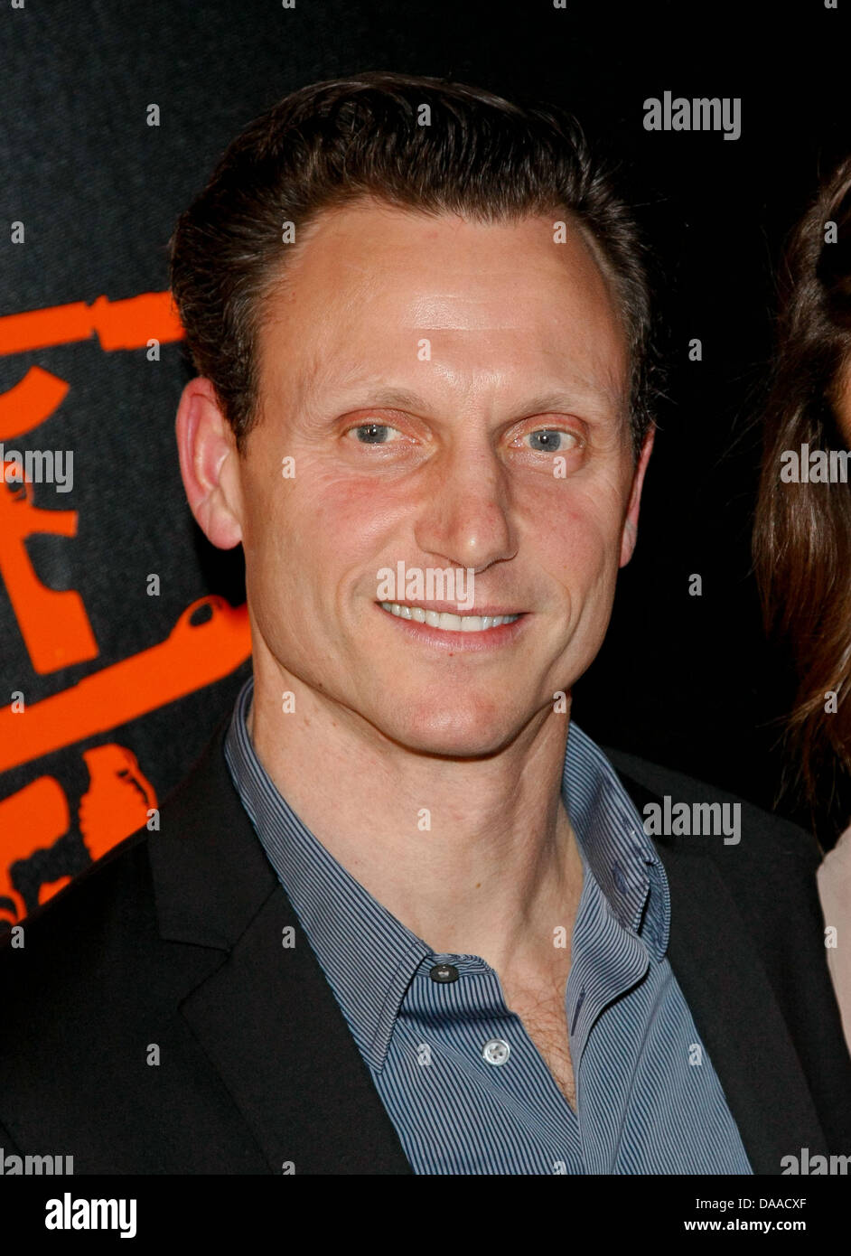 Actor Tony Goldwyn arrives at the premiere of "The Mechanic" at ...