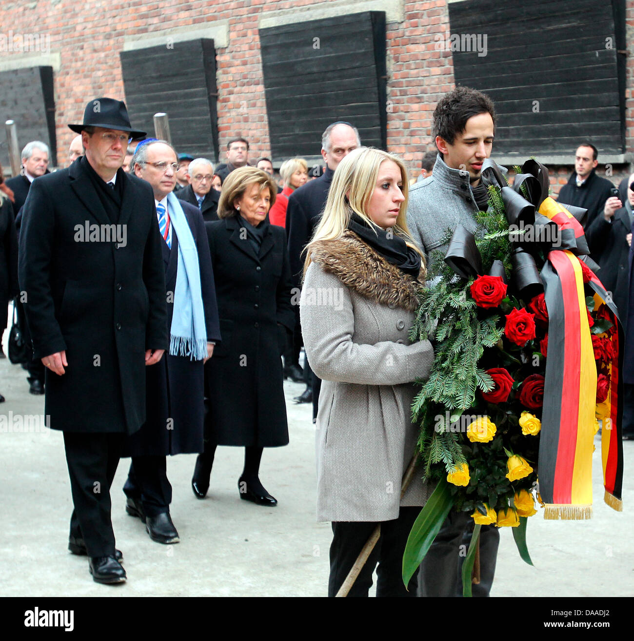 German President Christian Wulff (L) lays a wreath with Chairman of ...
