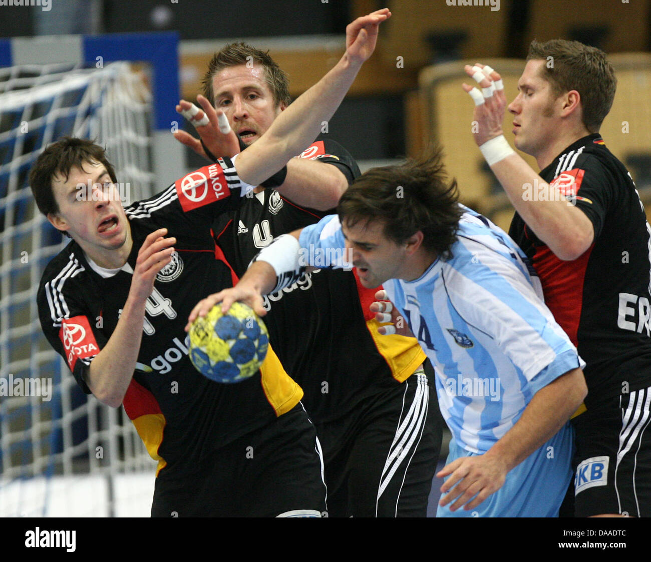 Patrick Groetzki (L-R), Oliver Roggisch and Sebastian Preiss of Germany ...