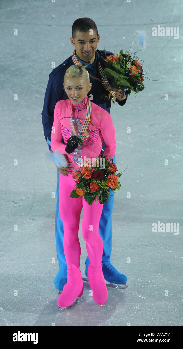Germany's Aljona Savchenko (R) and Robin Szolkowy (L) compete and win ...