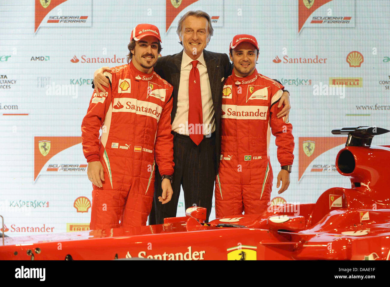 A Ferrari handout of Ferrari President Luca di Montezemolo (C) smiling ...
