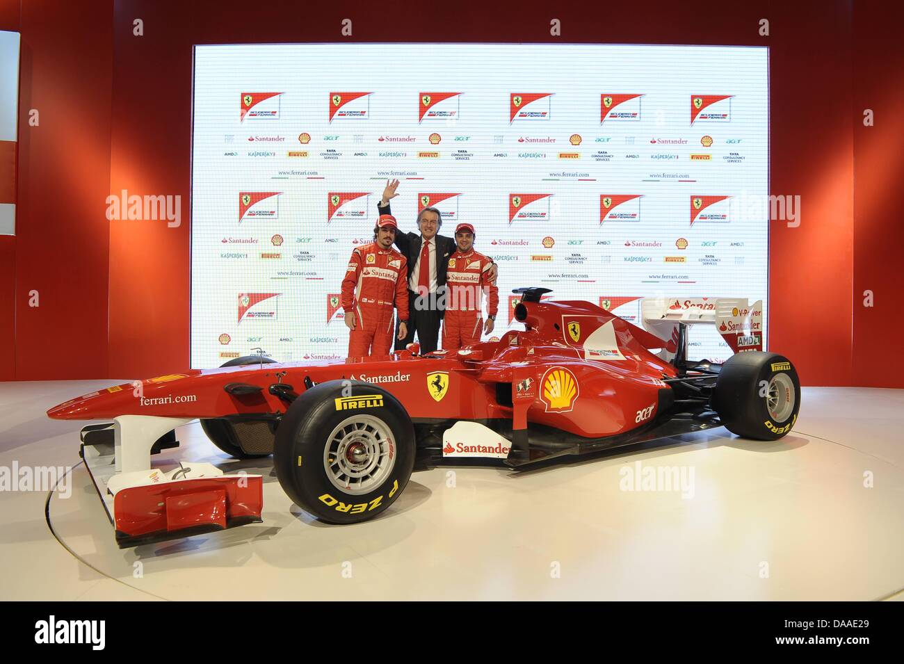 A Ferrari handout of Ferrari President Luca di Montezemolo (C) smiling ...