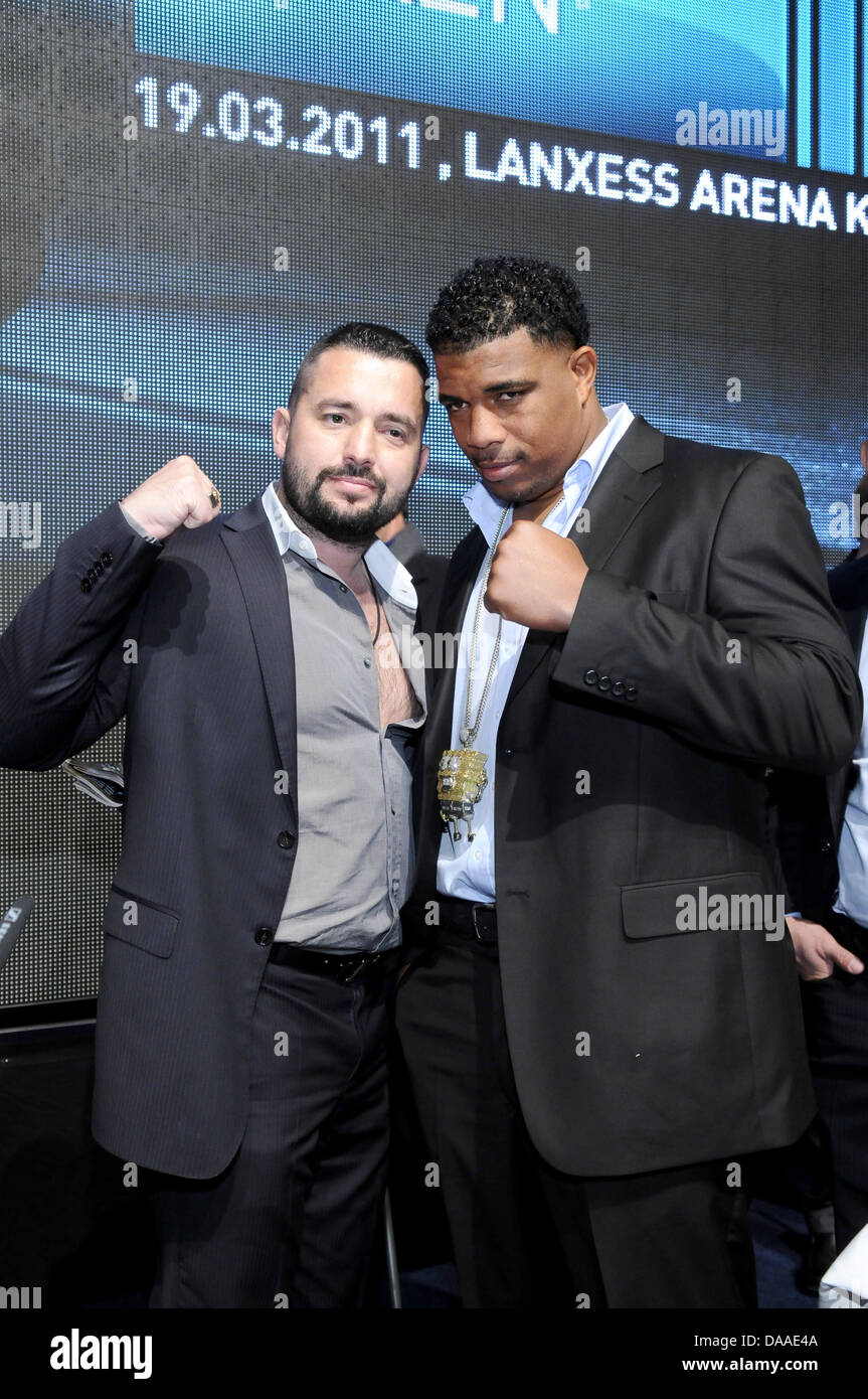 Cuban heavyweight boxer Odlanier Solis (R) and promoter Ahmet Oner (L ...