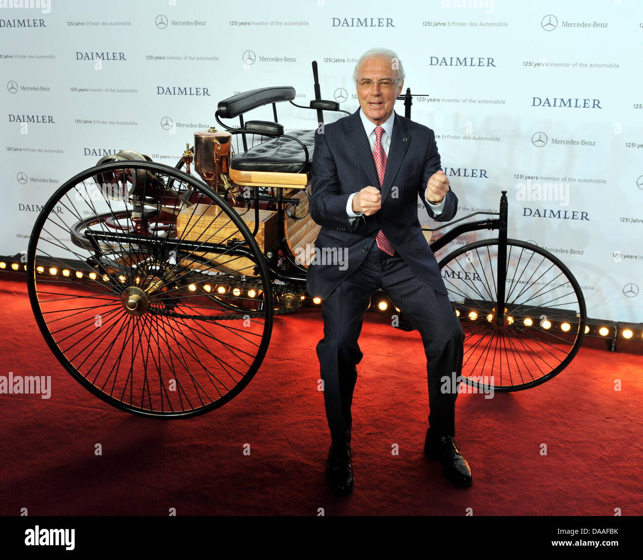 German soccer icon Franz Beckenbauer sits on a motorcar at the ...