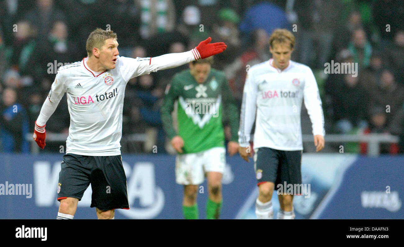 Munich's Bastian Schweinsteiger (L) during German Bundesliga match ...