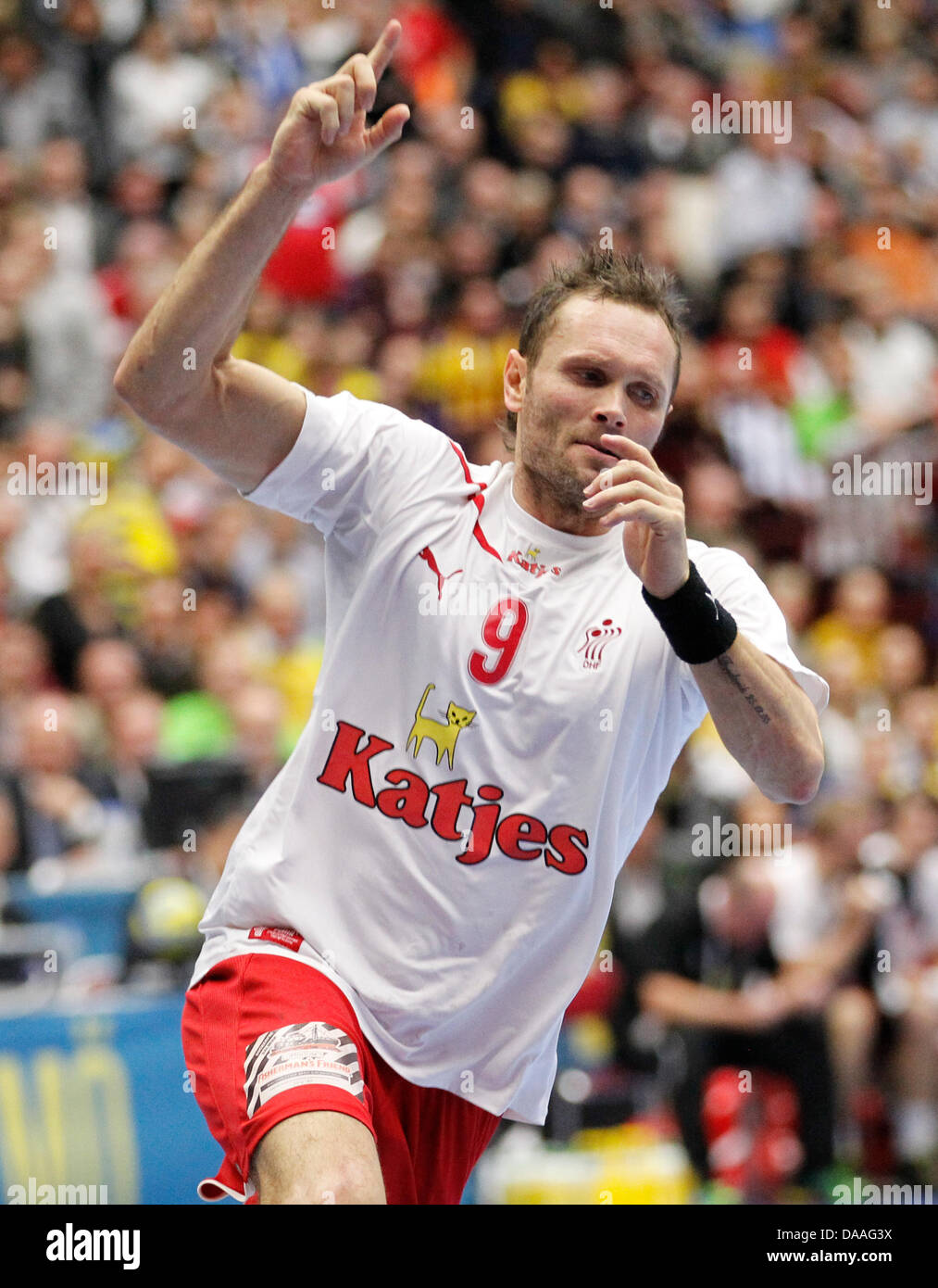 Lars Christiansen of Denmark cheers after scoring the final of the Men ...