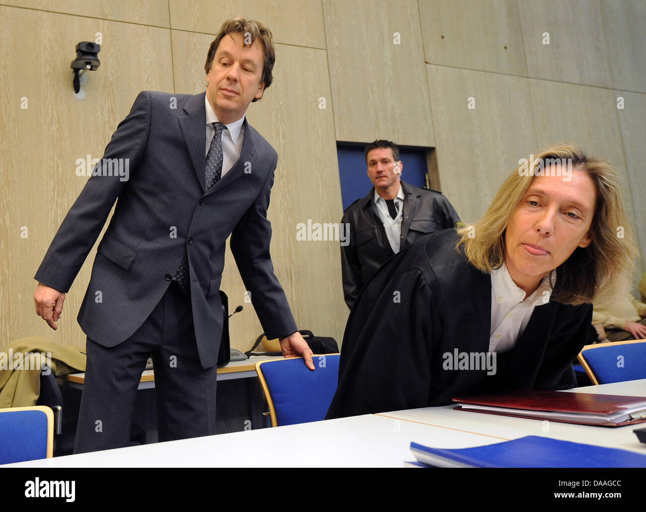 Swiss TV weather anchor Joerg Kachelmann (L) and his solicitor Andrea ...