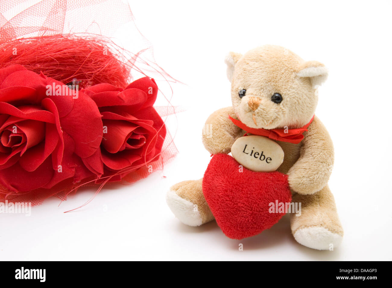 Teddy bear with heart Stock Photo - Alamy