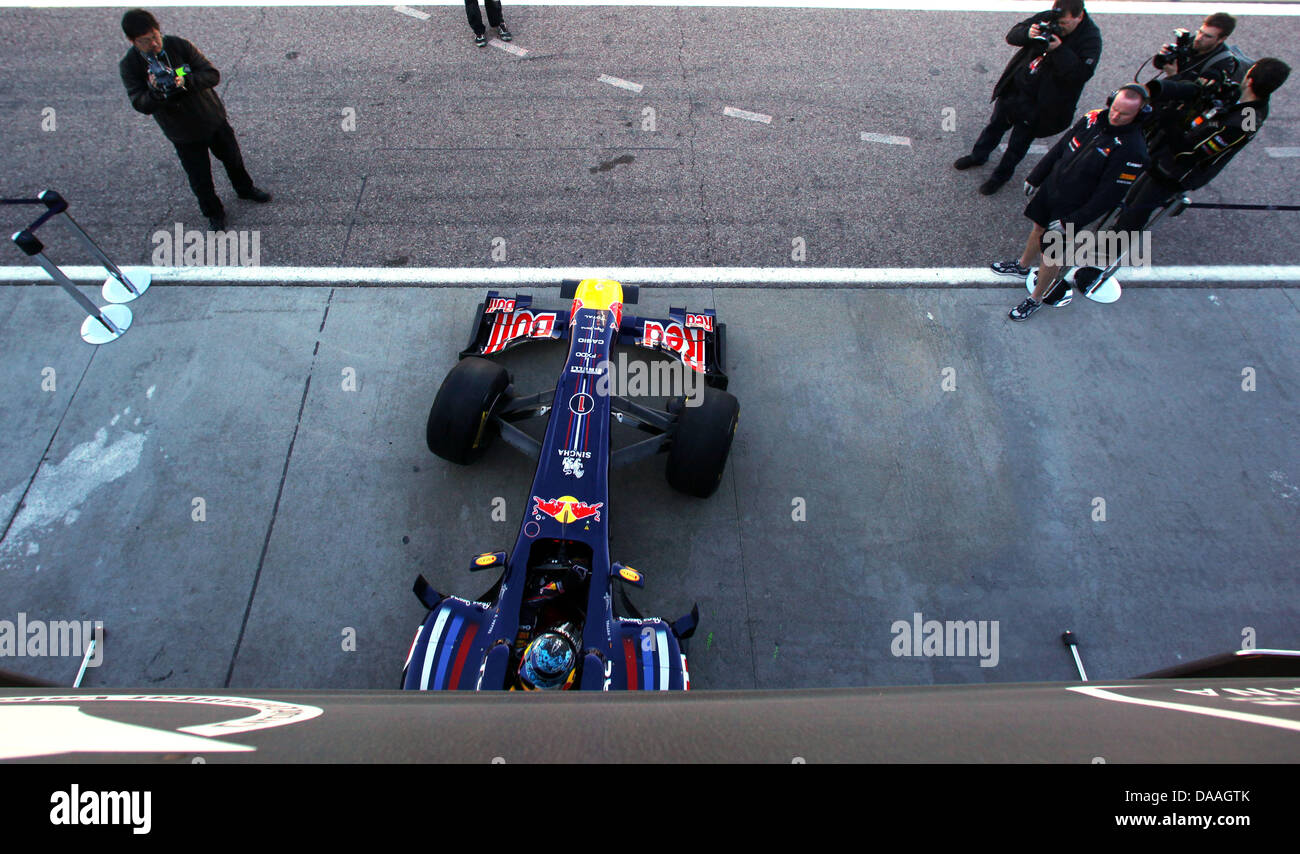 German Formula One driver Sebastian Vettel of Red Bull Racing exits the ...