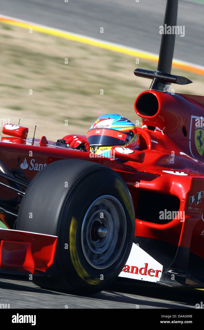 Spanish Formula One race driver Fernando Alonso of Ferrari drives on ...