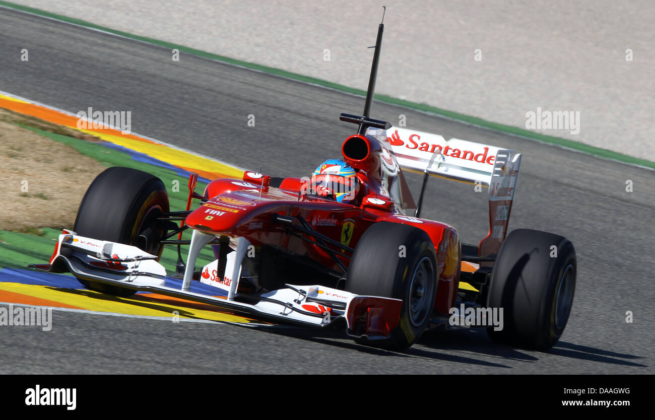 Spanish Formula One race driver Fernando Alonso of Ferrari drives on ...