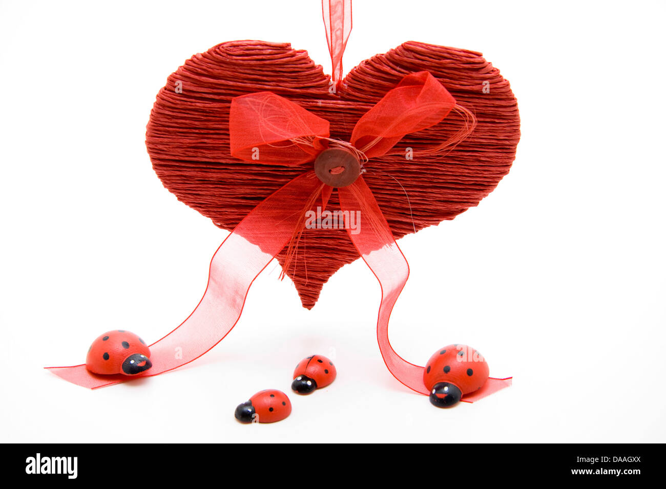 Red heart with beetle Stock Photo - Alamy