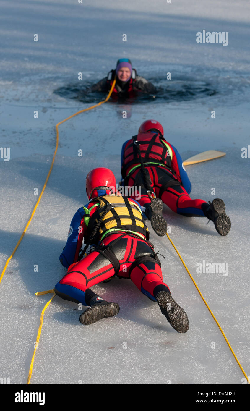 An emergency helper of the German Red Cross Water Rescue team takes ...