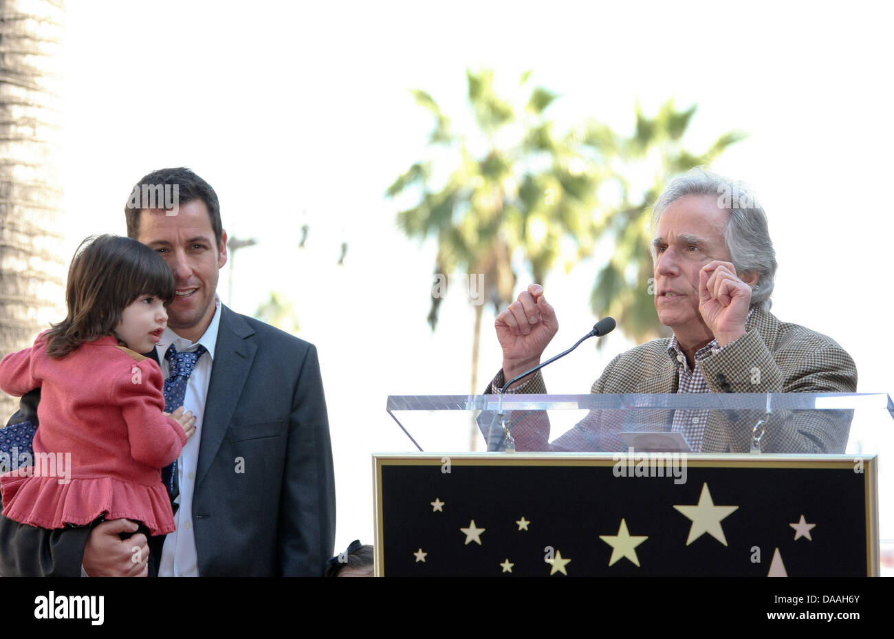 Actor Henry Winkler (r) speaks during a ceremony honoring actor Adam ...