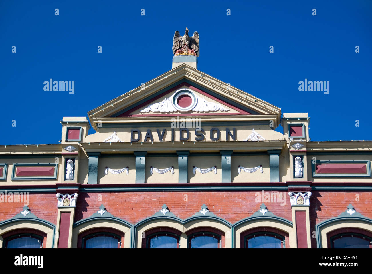 Close up on the phoenix rising rooftop carving of the historic Davidson ...