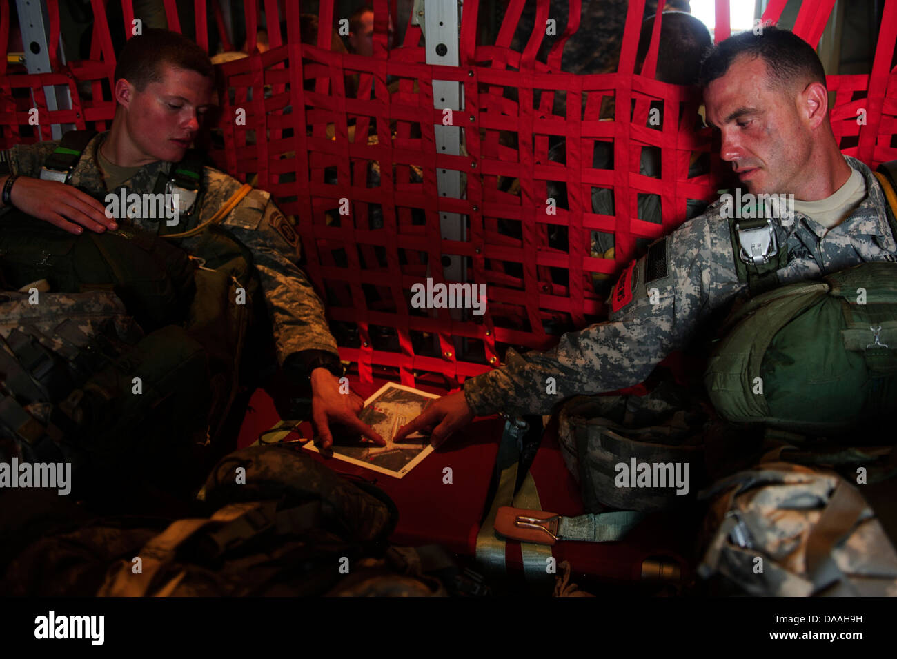 U.S. Army Staff Sgt. Leo Andrews, jump master assigned to the 82nd ...