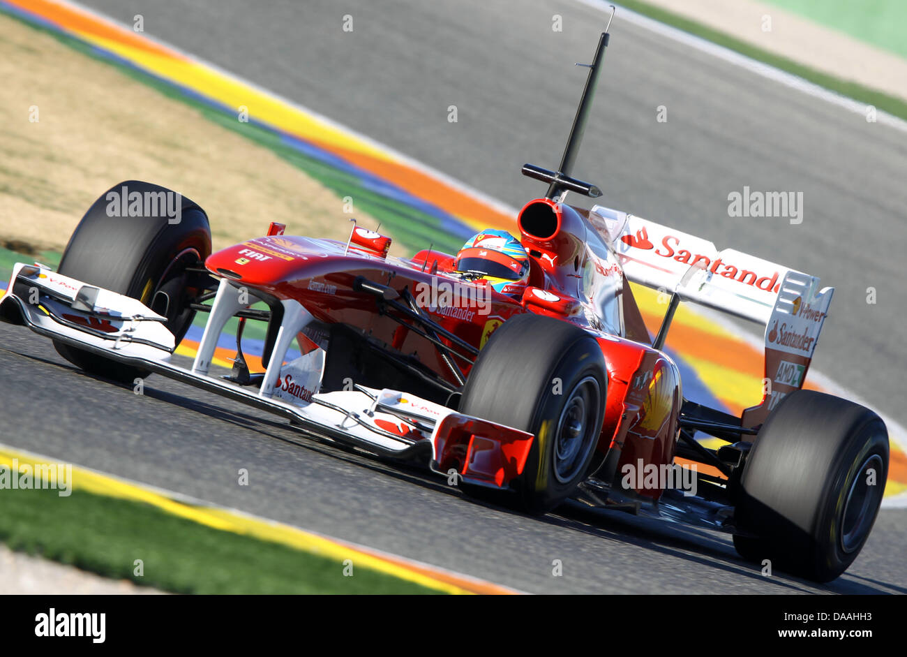 Spanish Formula One race driver Fernando Alonso of Ferrari drives along ...