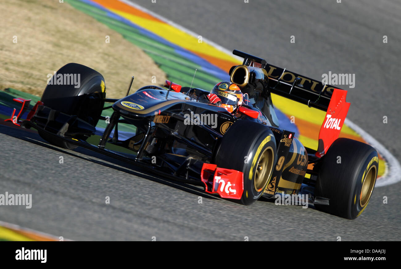 Polish Formula One race driver Robert Kubica of Renault drives along ...