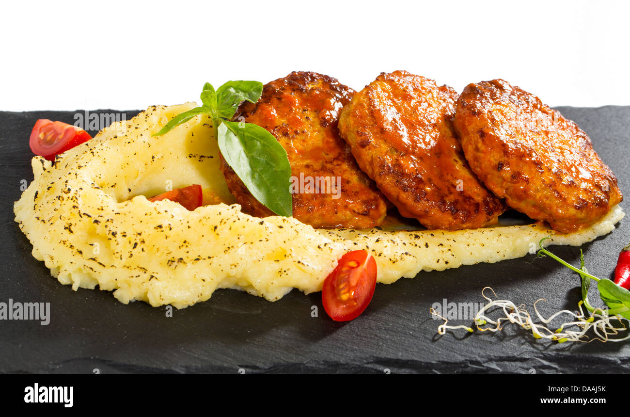 lamb ribs cooked on the grill served on a hot stone Stock Photo - Alamy