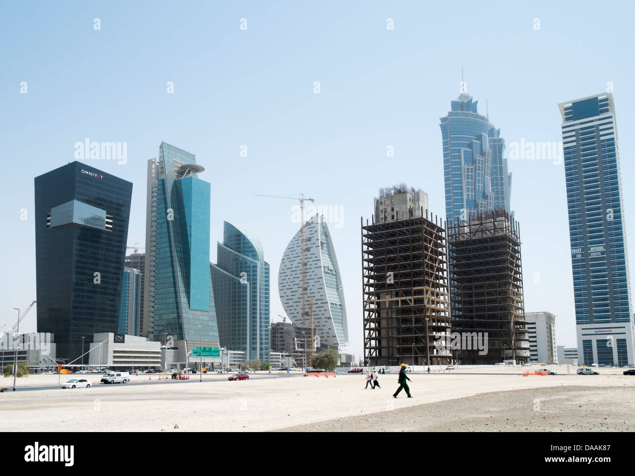 Modern skyscrapers under construction at Business Bay district in Dubai ...
