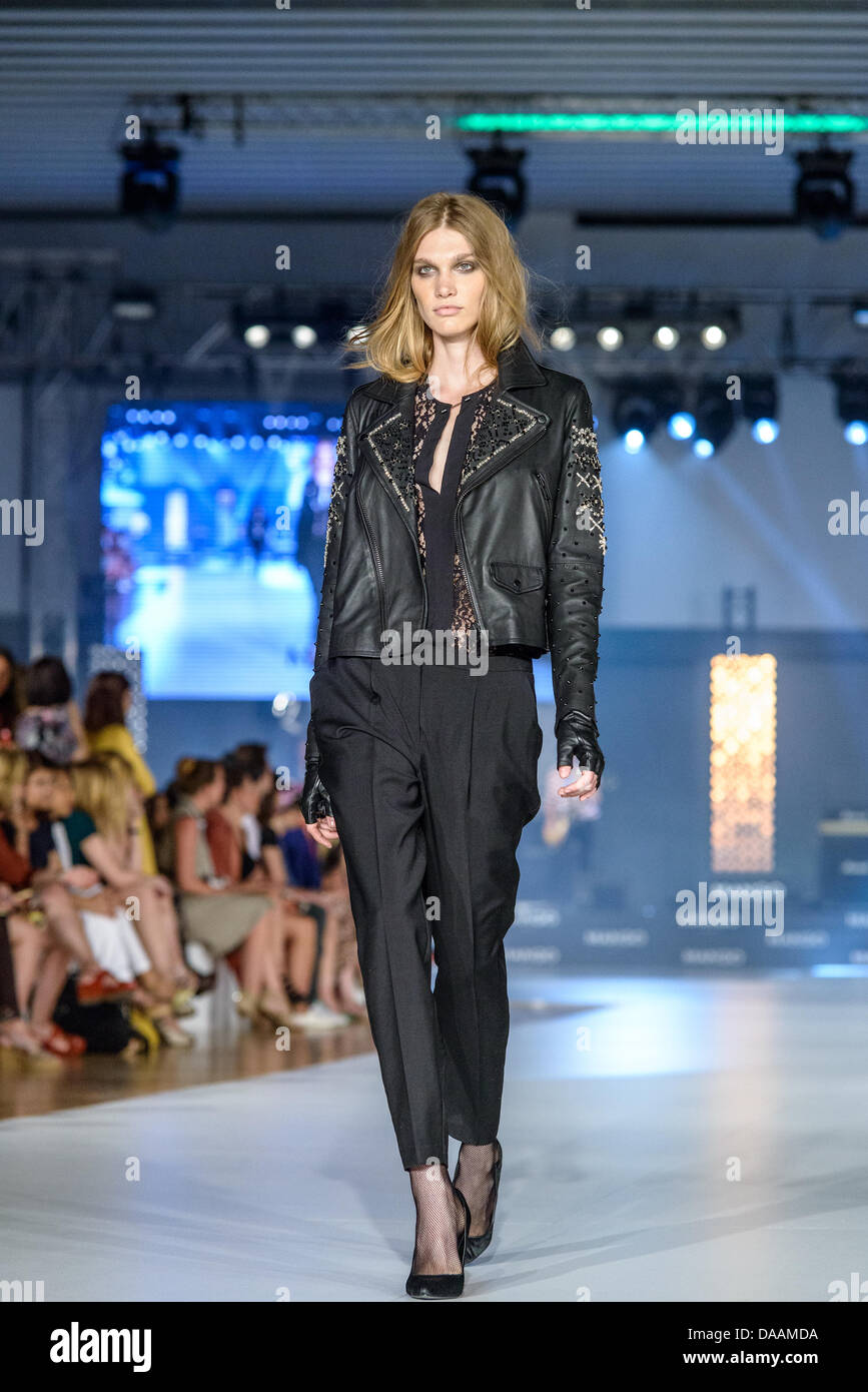 Barcelona, Spain. 7th July, 2013. Model on catwalk presents the Mango ...