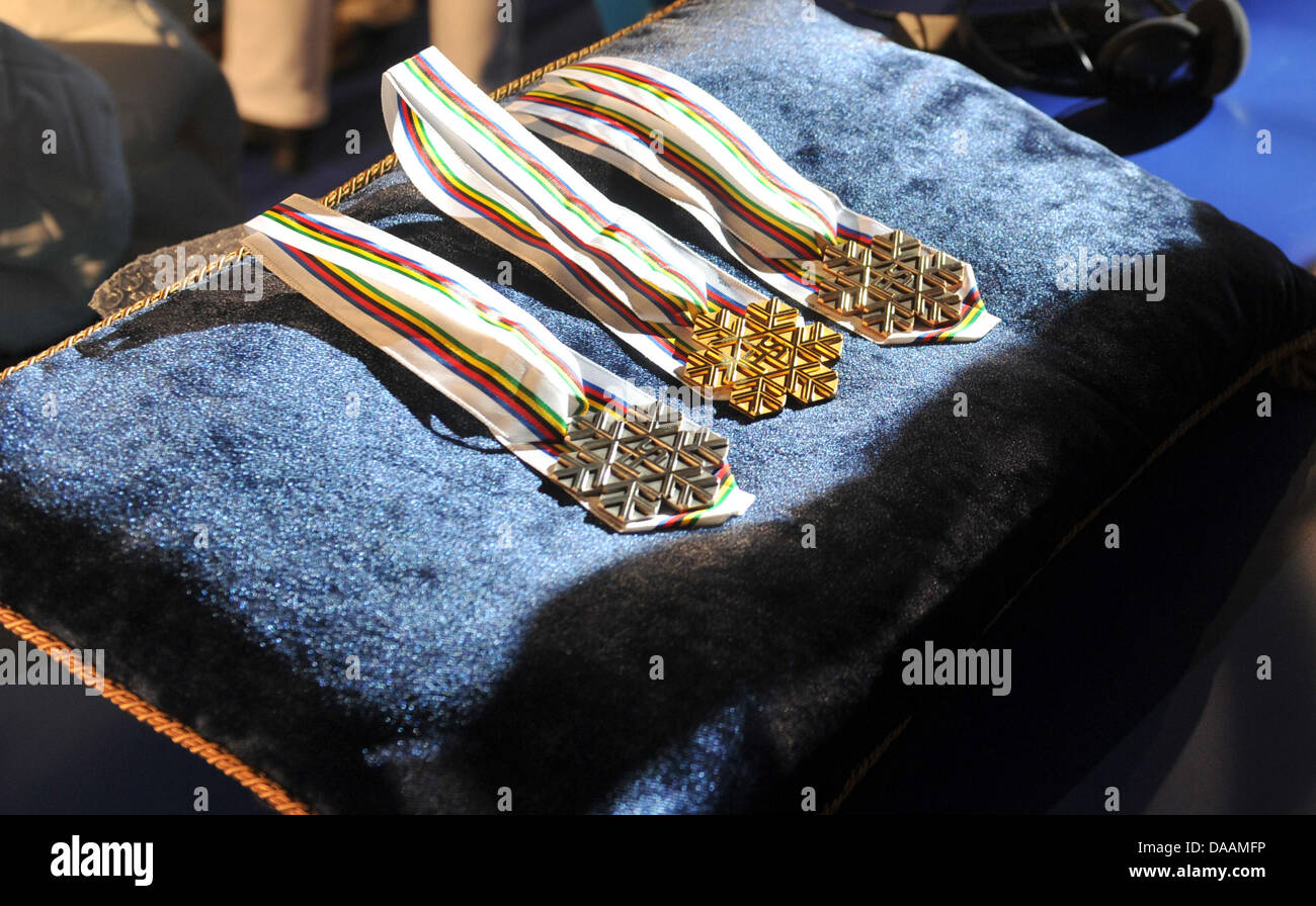 The medals of the International Ski Association FIS in silver (l-r ...