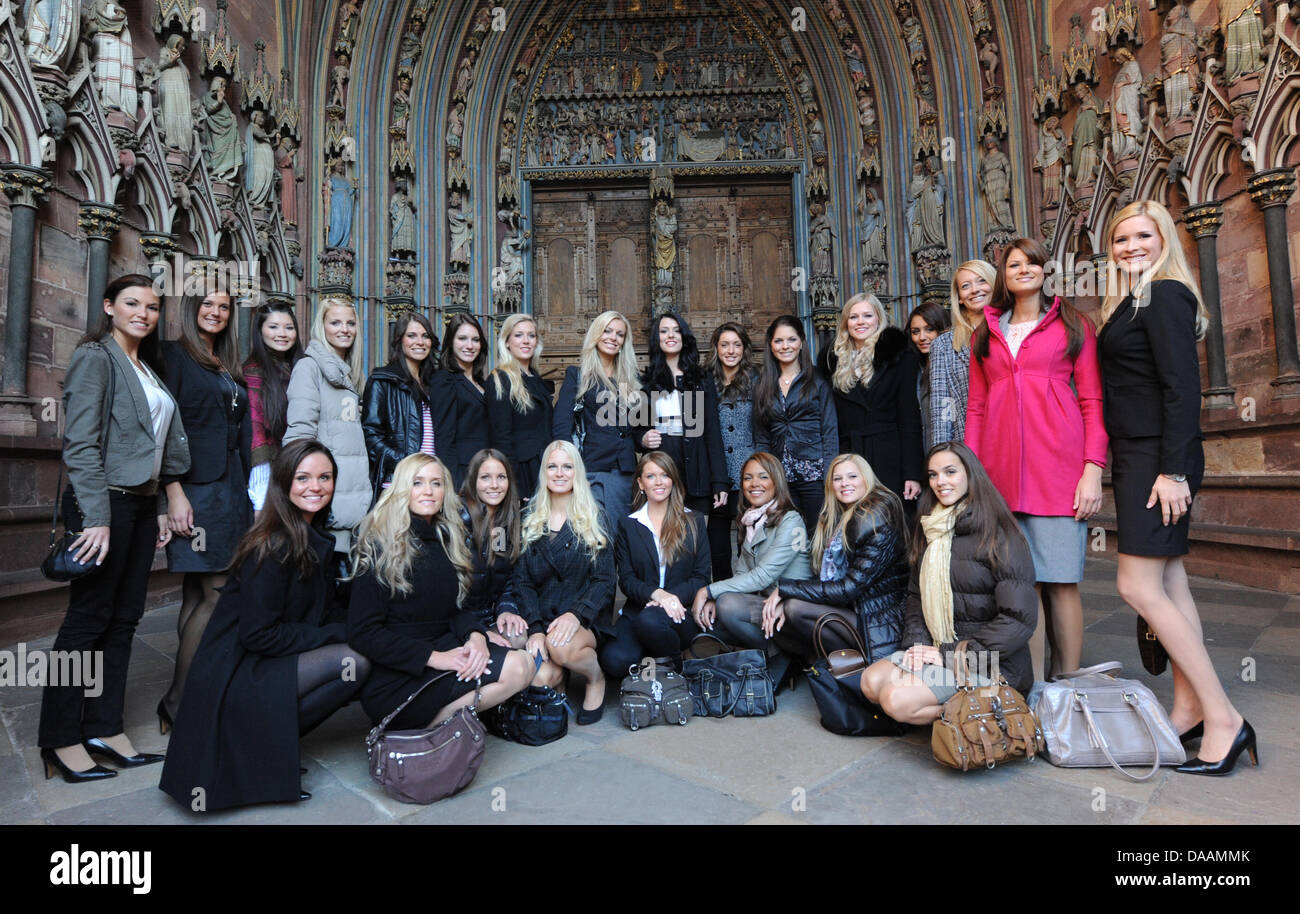Miss Germany candidates pose for a picture in front of the entrance to ...