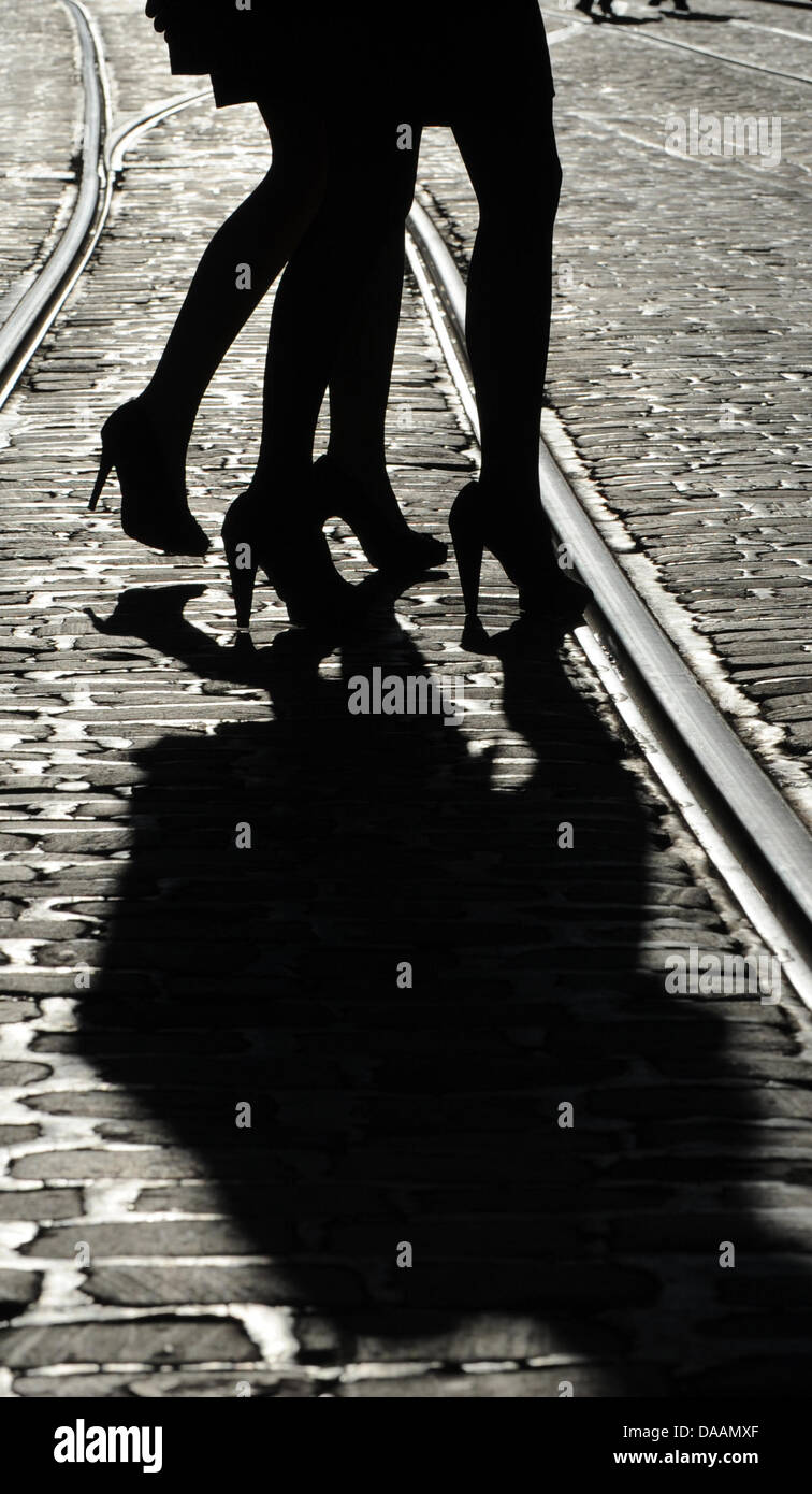 Entrants in Miss Germany beauty pageant walk over a cobbled street in ...